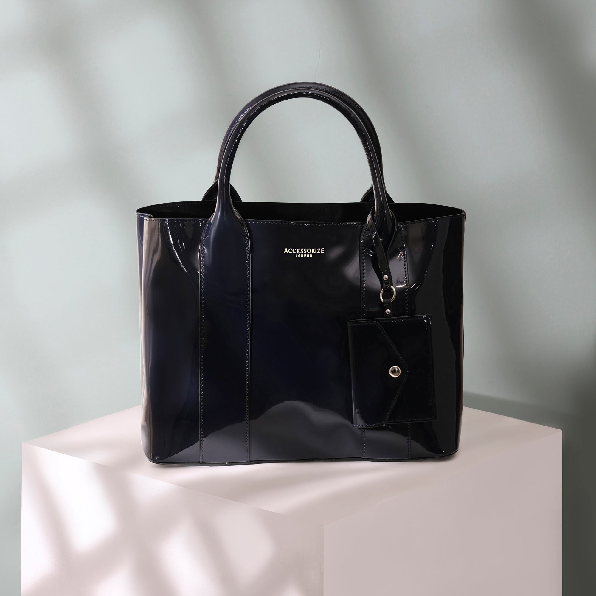 Buy Navy Patent Handheld Bag Online - Accessorize India